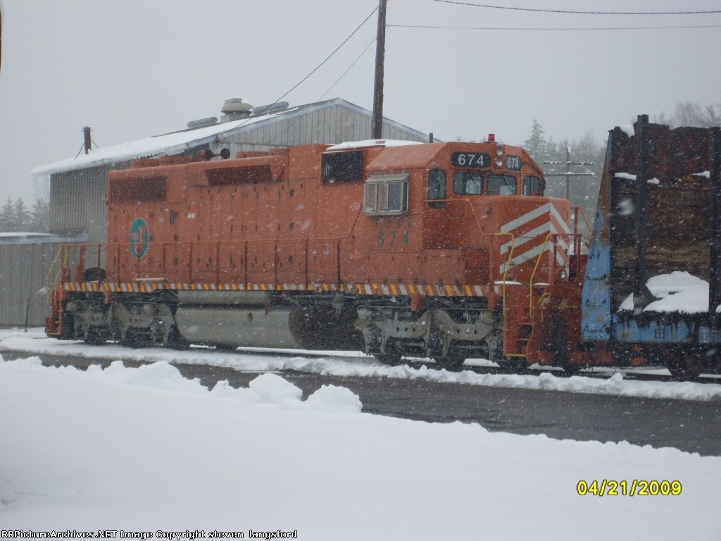 EJ&E # 674 On A Snowy Spring Day